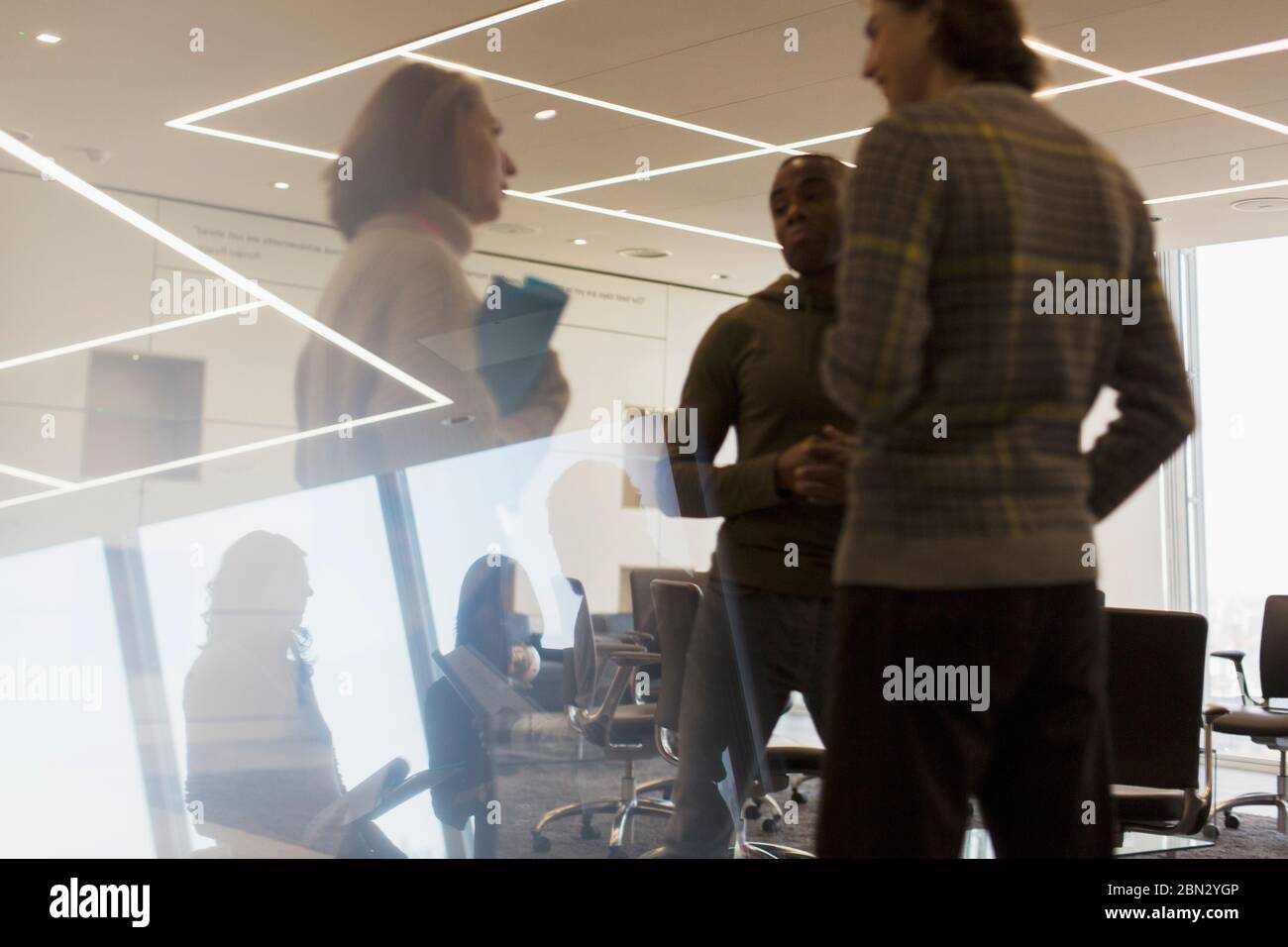 Business people talking in conference room Stock Photo - Alamy