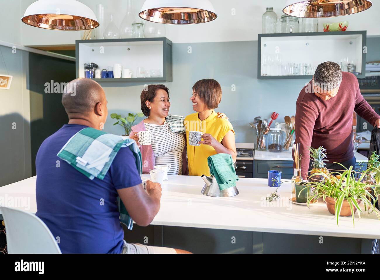 Friends drinking tea stand hi-res stock photography and images - Alamy