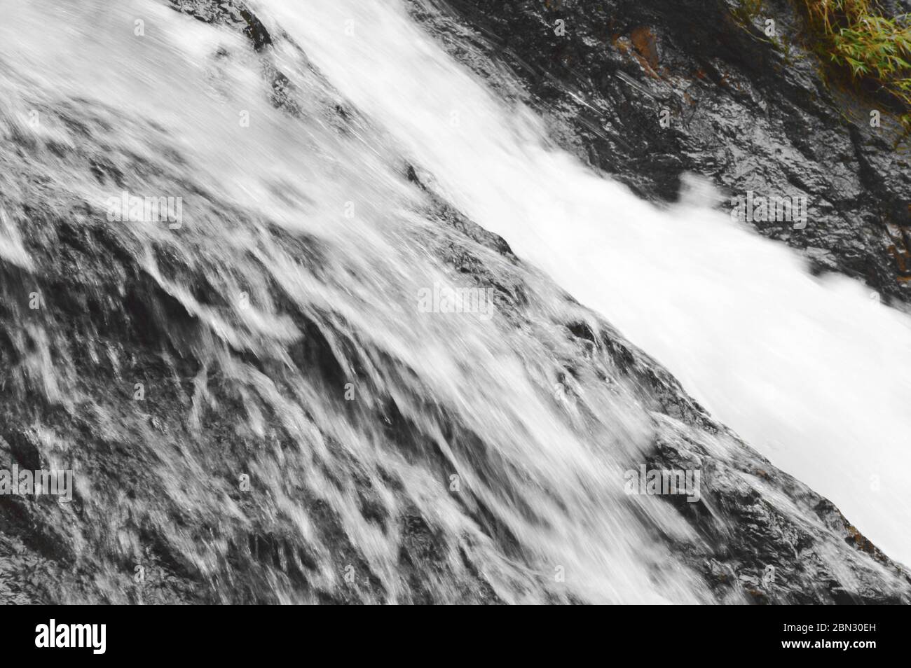 waterfall falling and hit rock splashing to river Stock Photo - Alamy