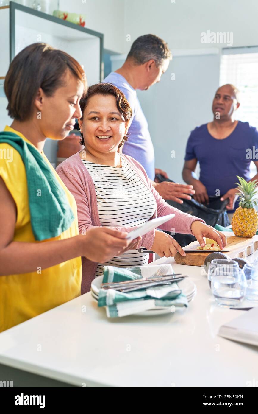 Mature woman cooking kitchen hi-res stock photography and images - Alamy