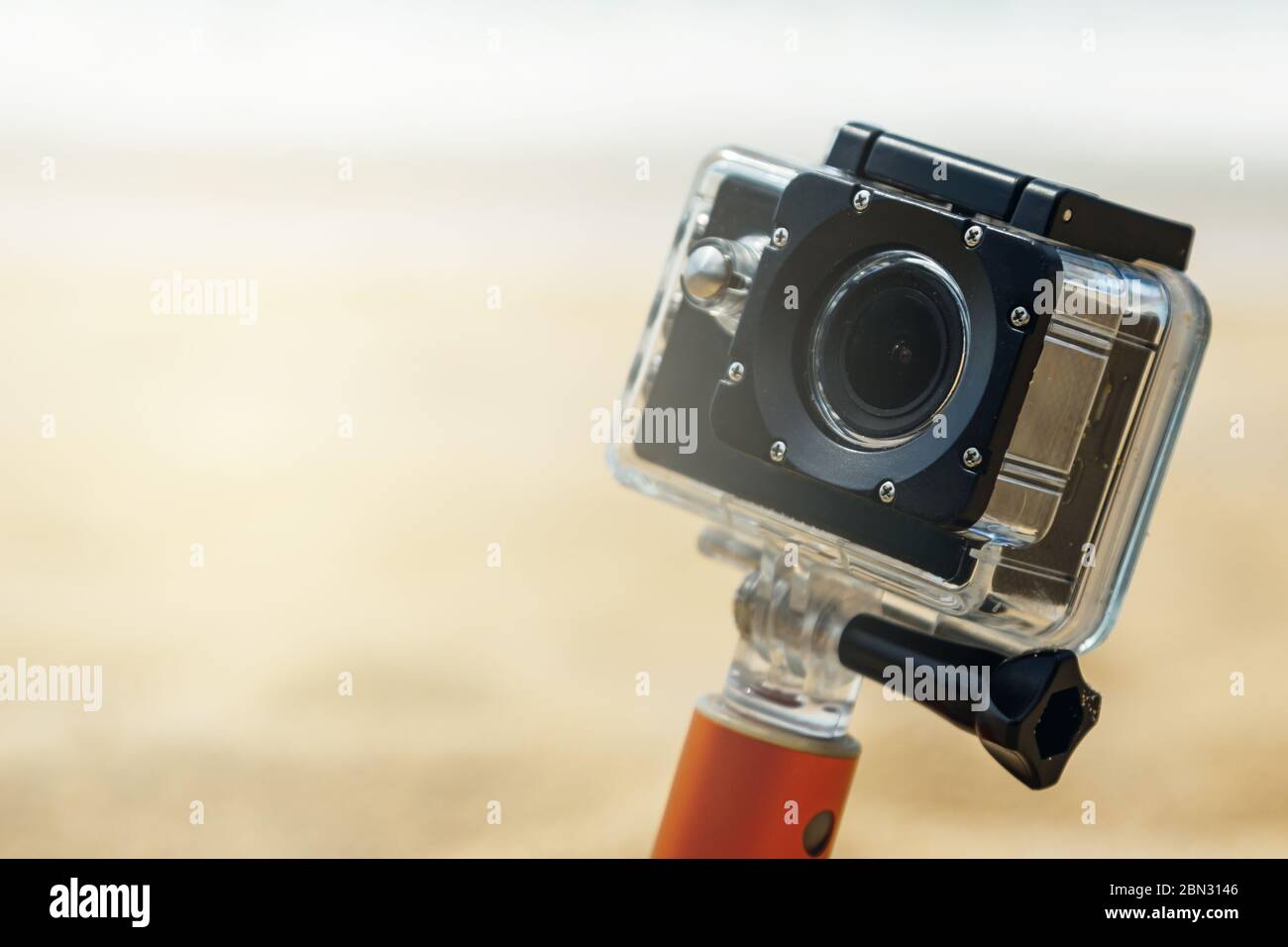 Action camera in waterproof case on the beach Stock Photo - Alamy