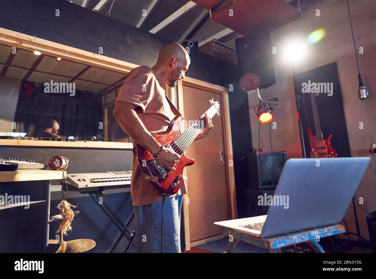 Practicing guitar hi-res stock photography and images - Alamy