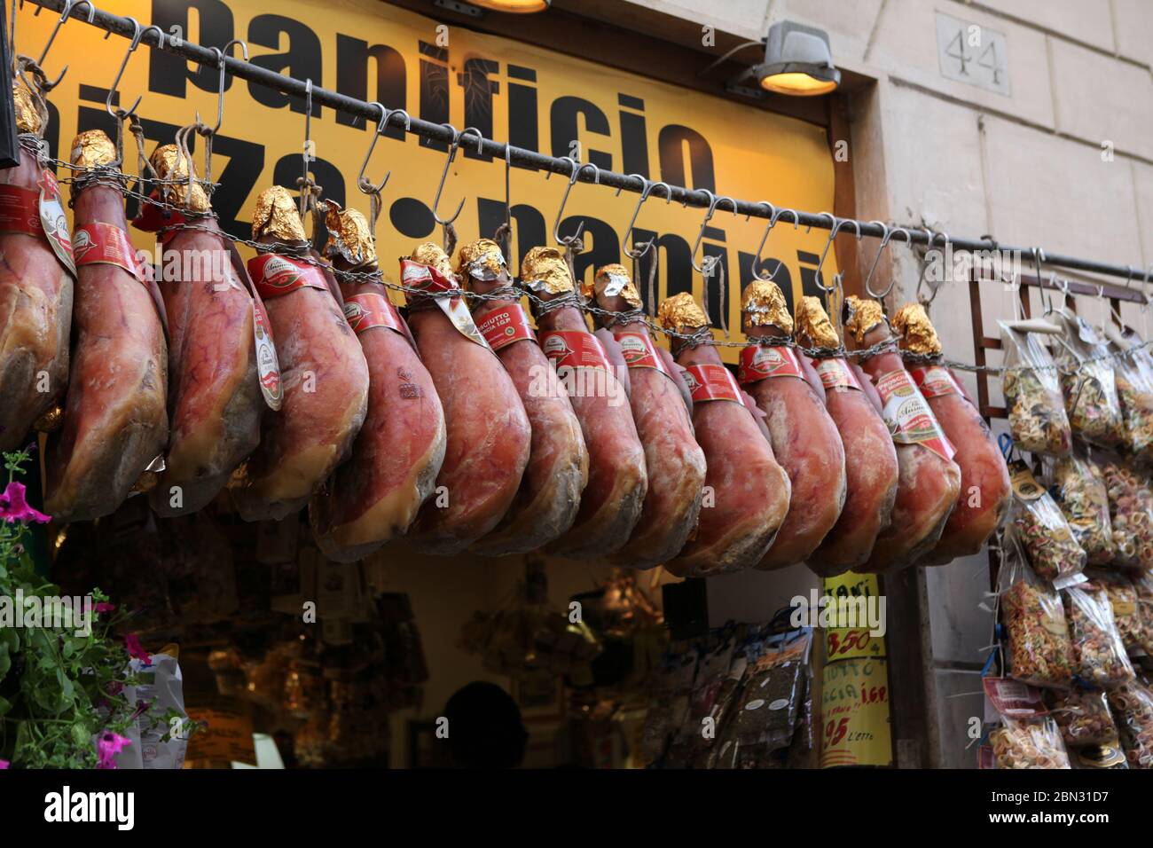 Hanging rack outside shop hi-res stock photography and images - Alamy