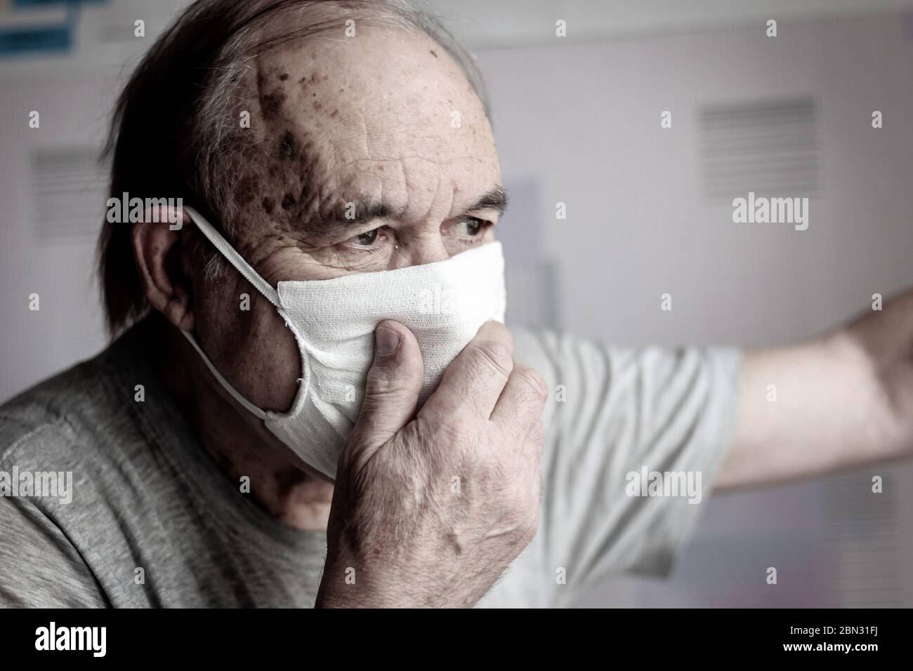Elderly man at home isolation Stock Photo - Alamy