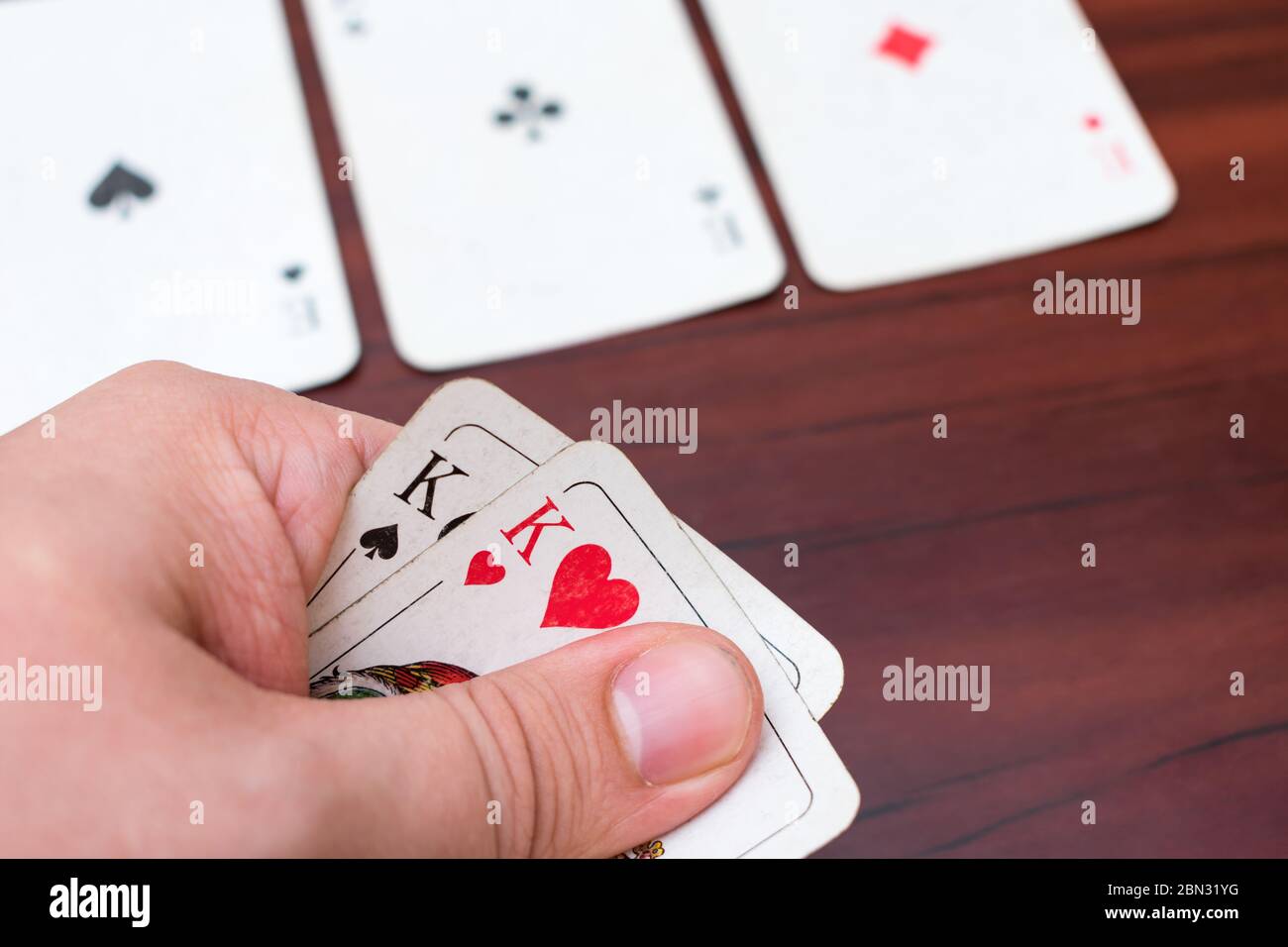 A good combination of cards in a poker game, two kings and three aces ...