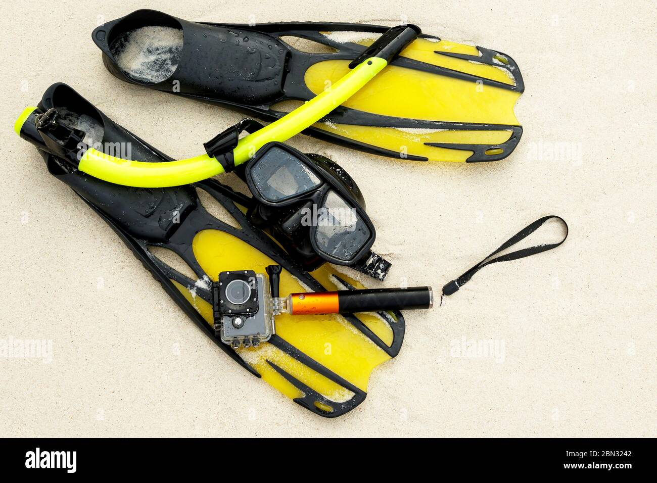 Equipment for snorkeling and action camera in waterproof case on the ...