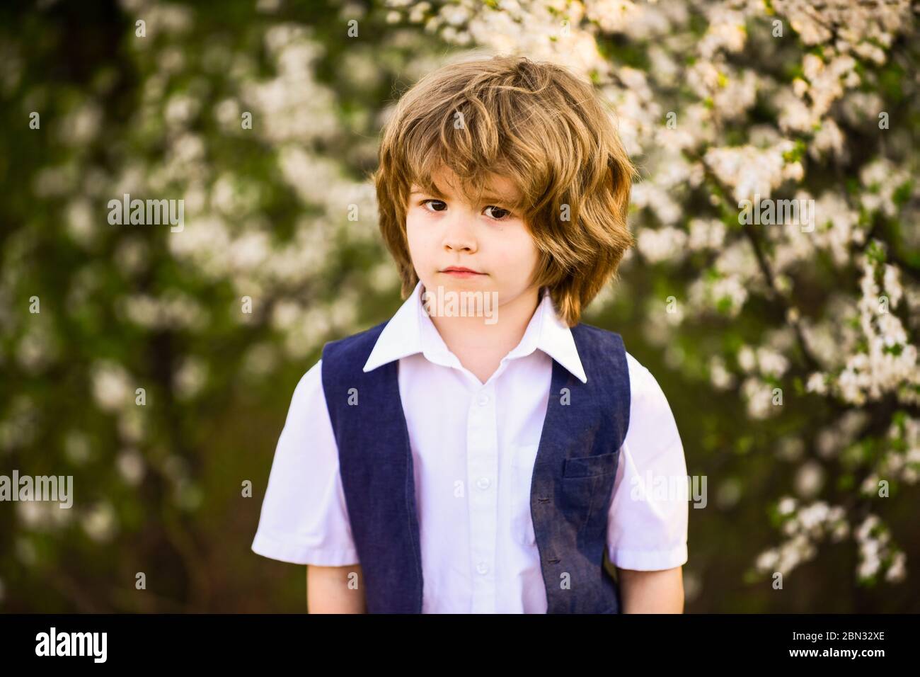 Cute kid. Gender identity. Adorable boy spring garden. International ...