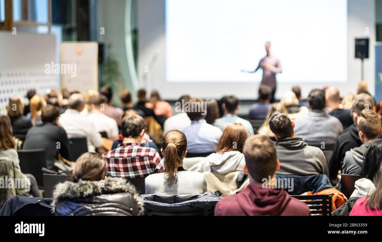Business speaker giving a talk at business conference event Stock Photo ...