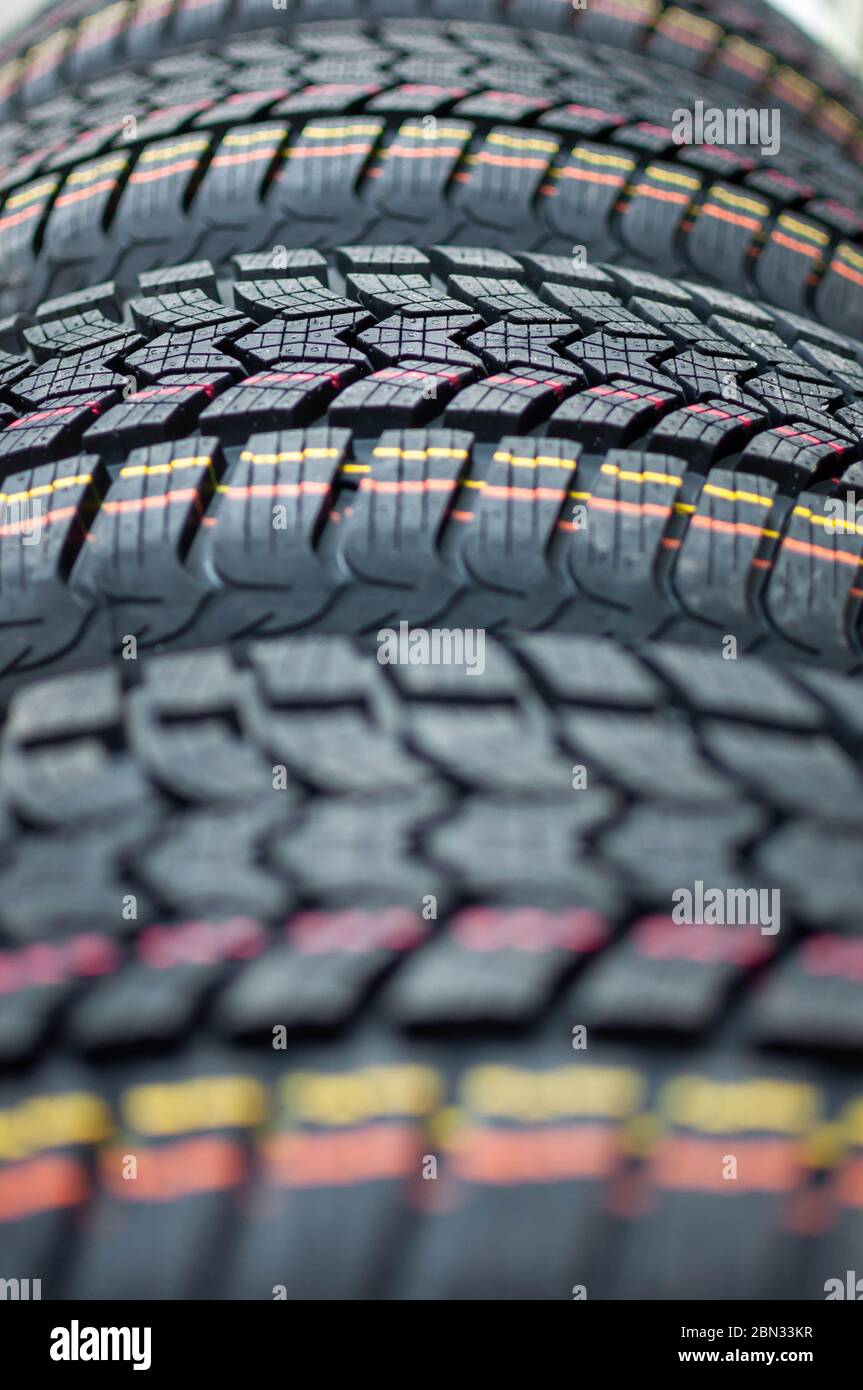 New tires in a row II Stock Photo - Alamy