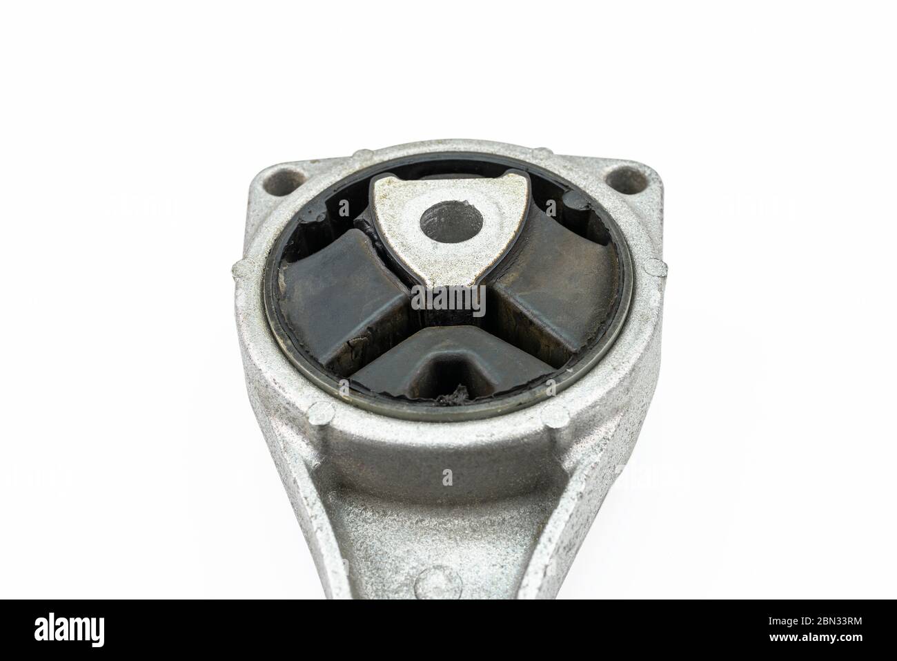 Cracked rubber, an engine mount, in the shape of an arm, used to ...