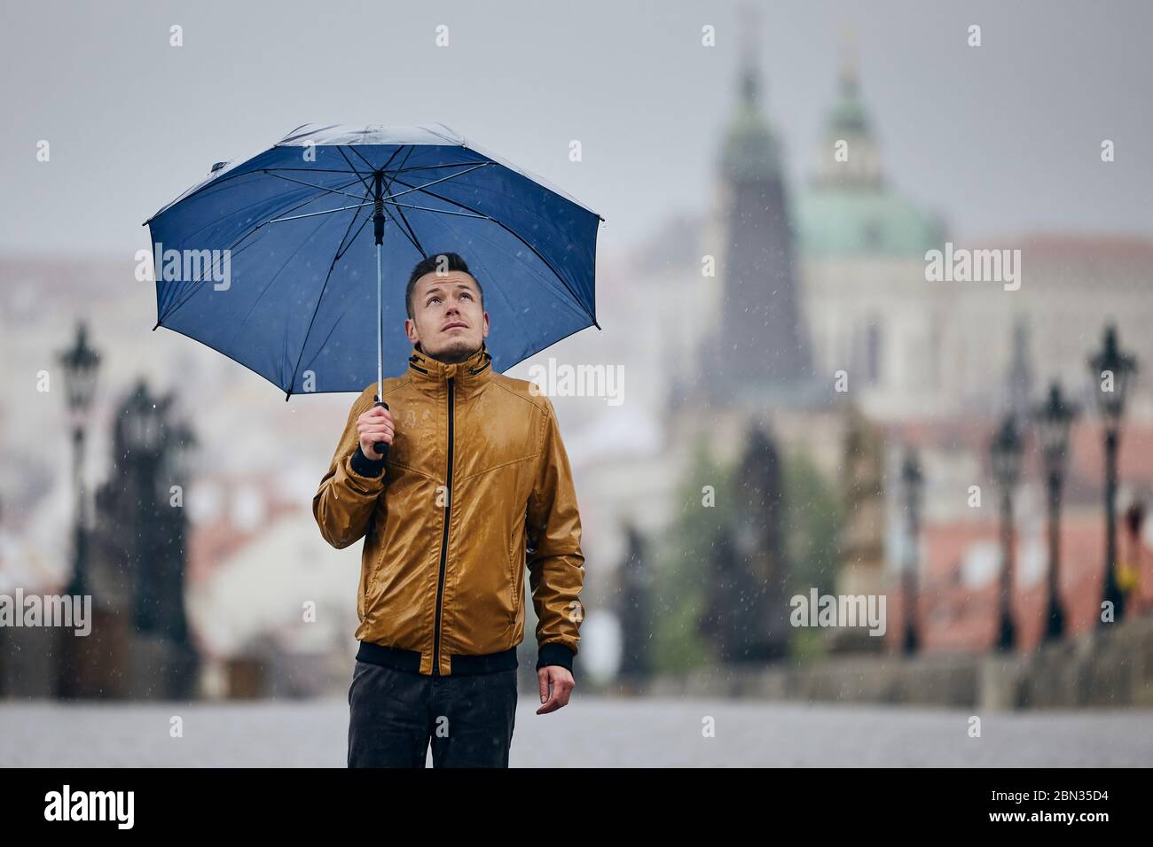 Lonely Man Walking In Rain