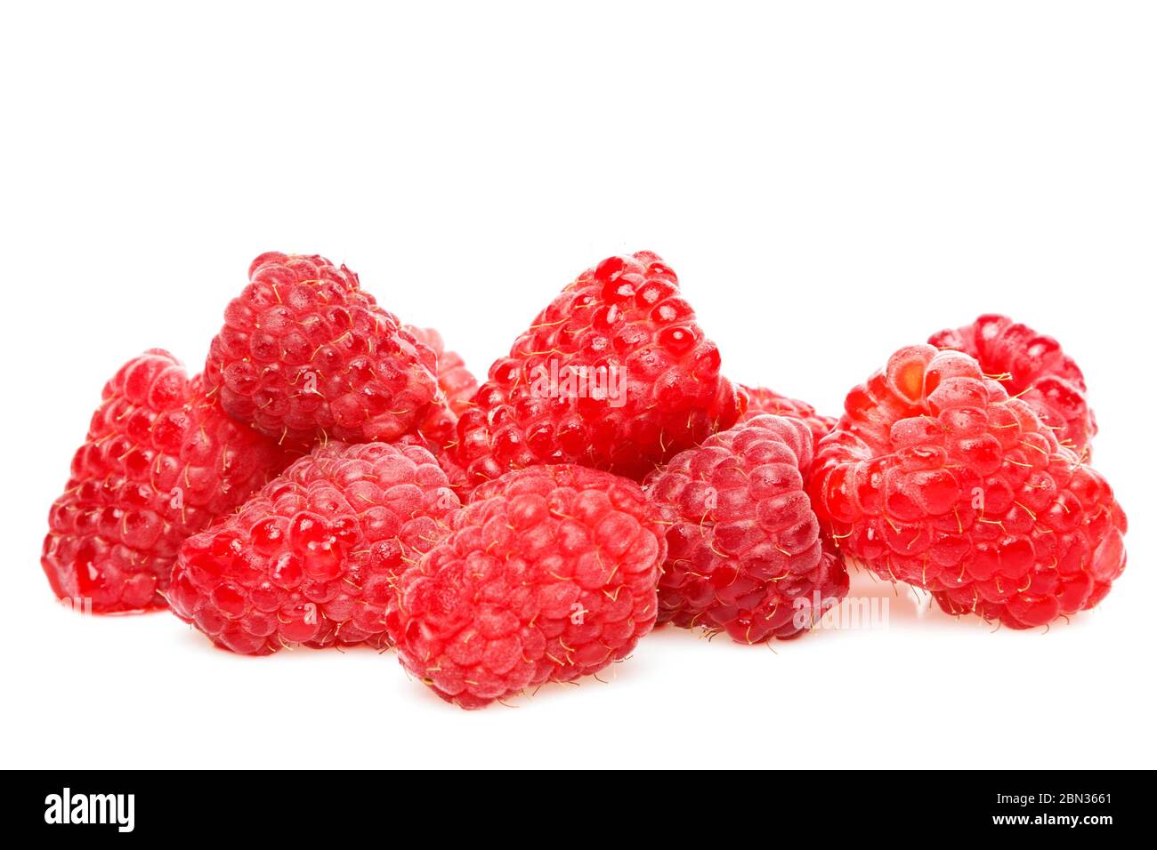 Fresh raspberries on white background Stock Photo - Alamy