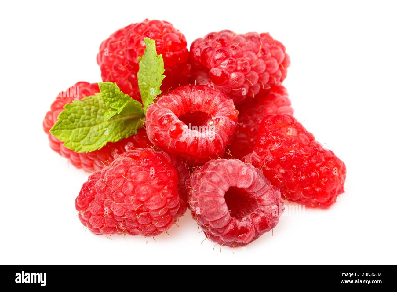 Fresh raspberries on white background Stock Photo - Alamy