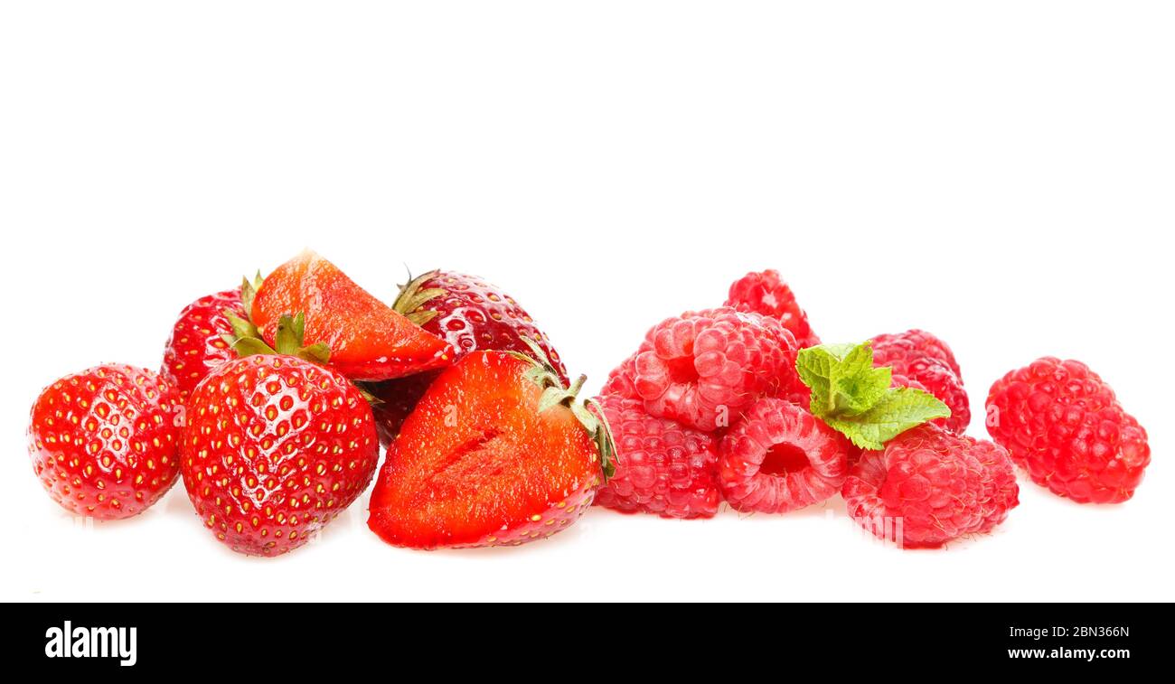 Rasberry and strawberry on white background Stock Photo - Alamy