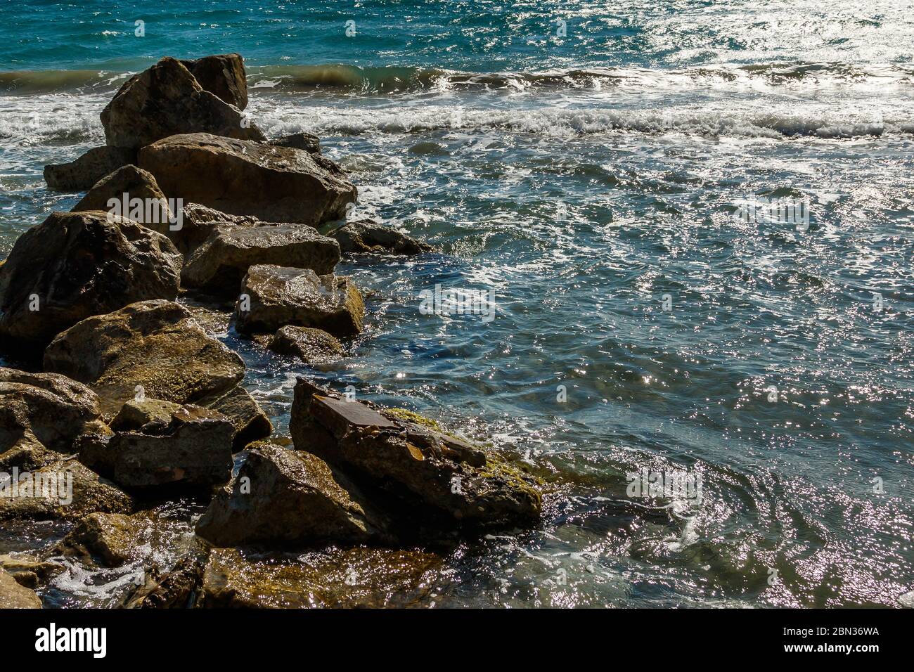 Beautiful seascape with blue water and rocks Stock Photo - Alamy