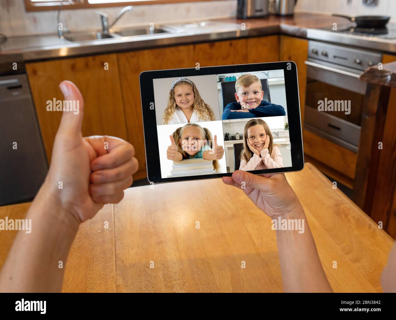 COVID-19 Online Education. Screen image of primary students pupils in ...