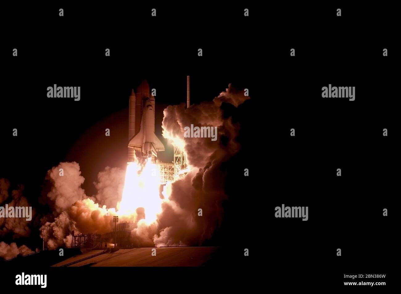 The launch of the space shuttle against the sky, fire and smoke ...