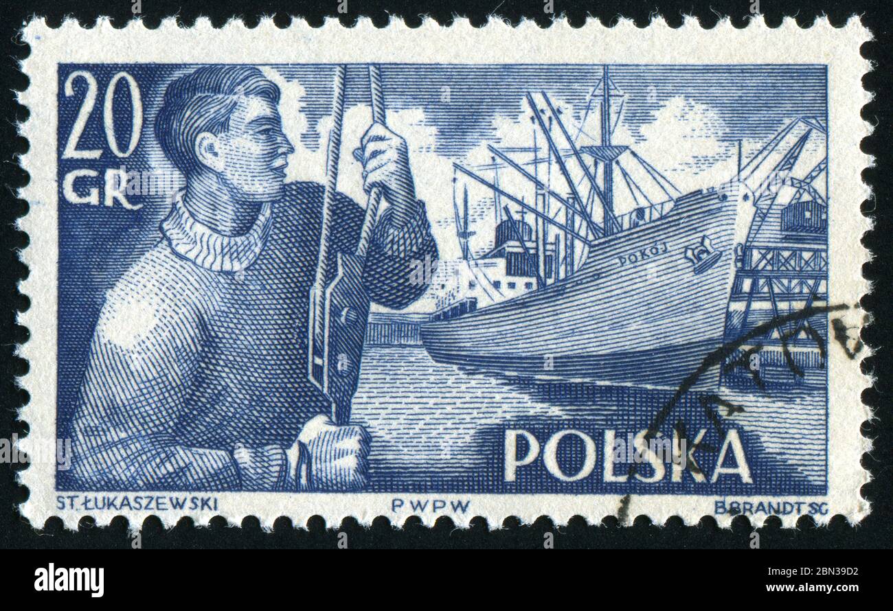 POLAND - CIRCA 1956: Dock worker and ship Pkoj, circa 1956 Stock Photo ...