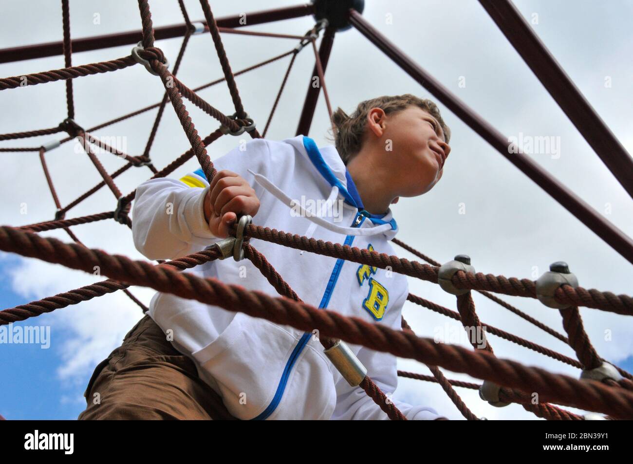 12 yr old boy playing on a rope structure at Beale Park wildlife park ...