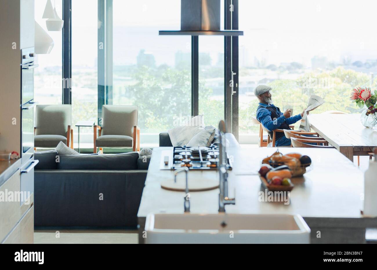 Person holding reading open newspaper hi-res stock photography and ...