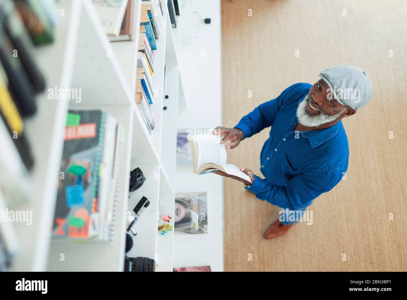 Boy reading a book standing up hi-res stock photography and images - Alamy