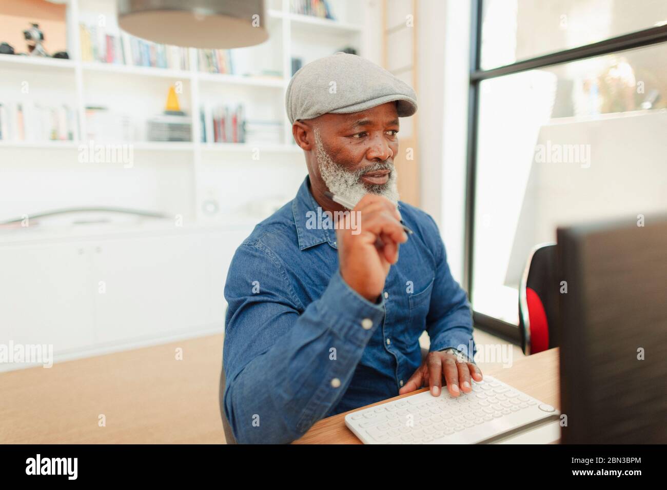 Man working home office with computer hi-res stock photography and ...