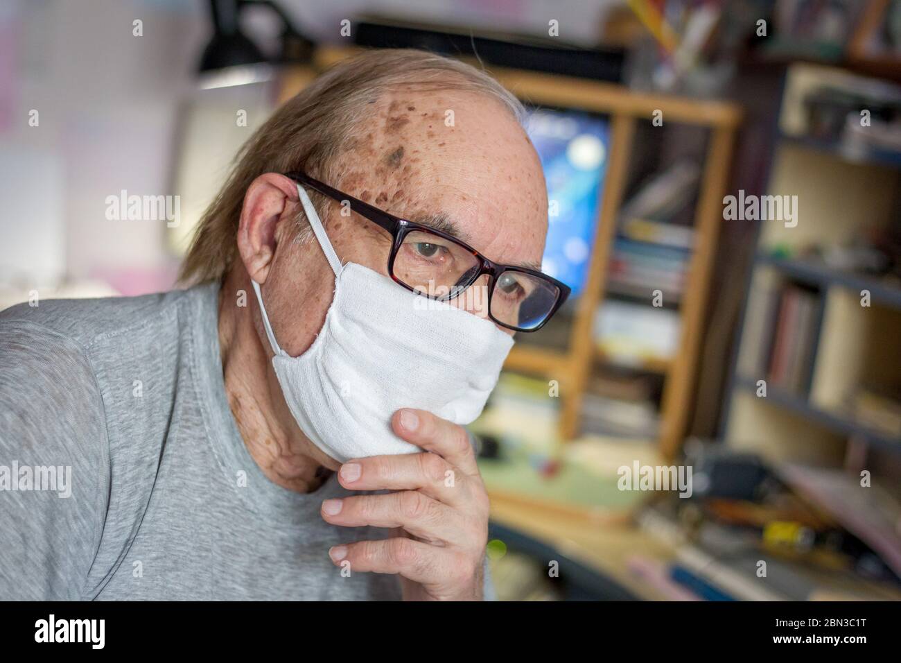 Elderly man at home isolation Stock Photo - Alamy