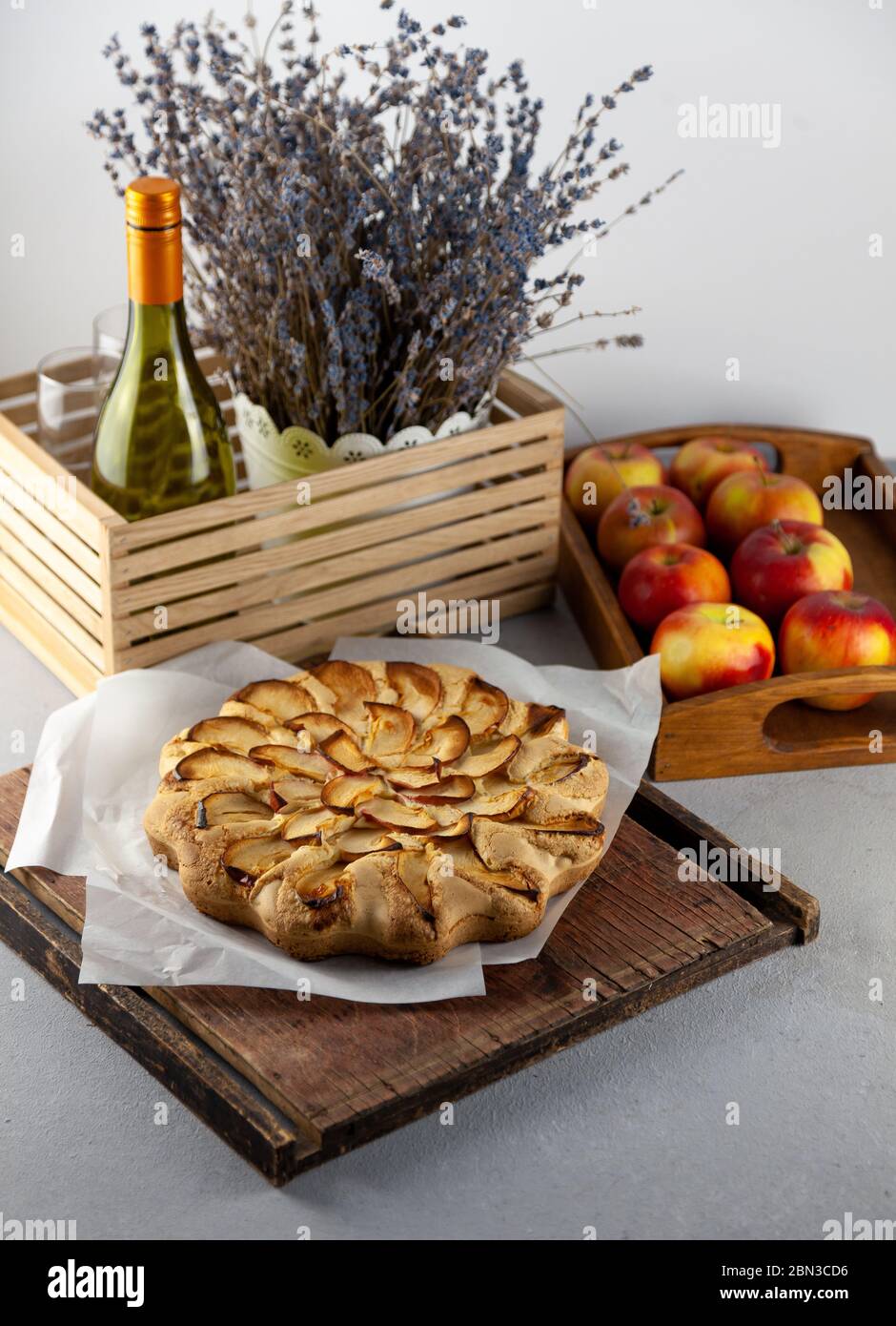 Apple pie and apples. Round homemade cake. Simple pastry made from ...