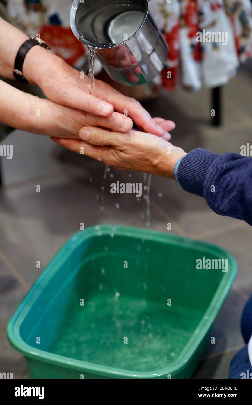 Feet washing ritual in a catholic church. Paray le Monial. France Stock ...