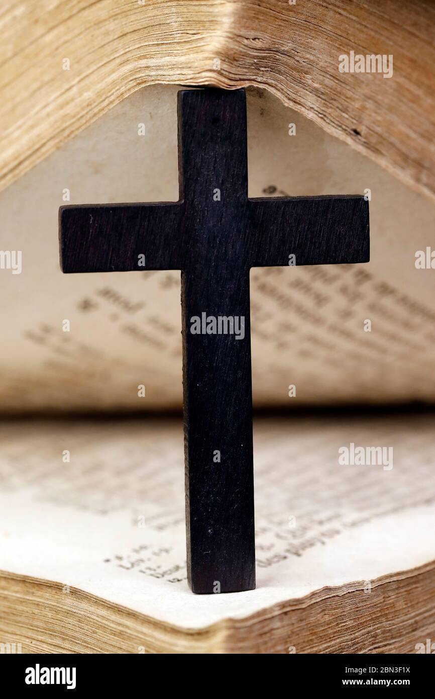 Christian cross and old Bible. 18 th century. France Stock Photo - Alamy