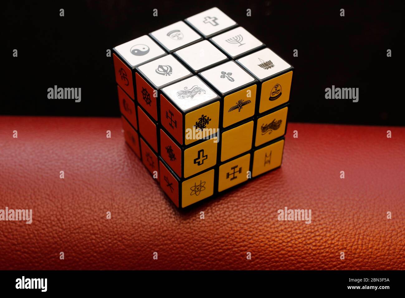 Rubik's cube with religious symbols. Interreligious and interfaith ...