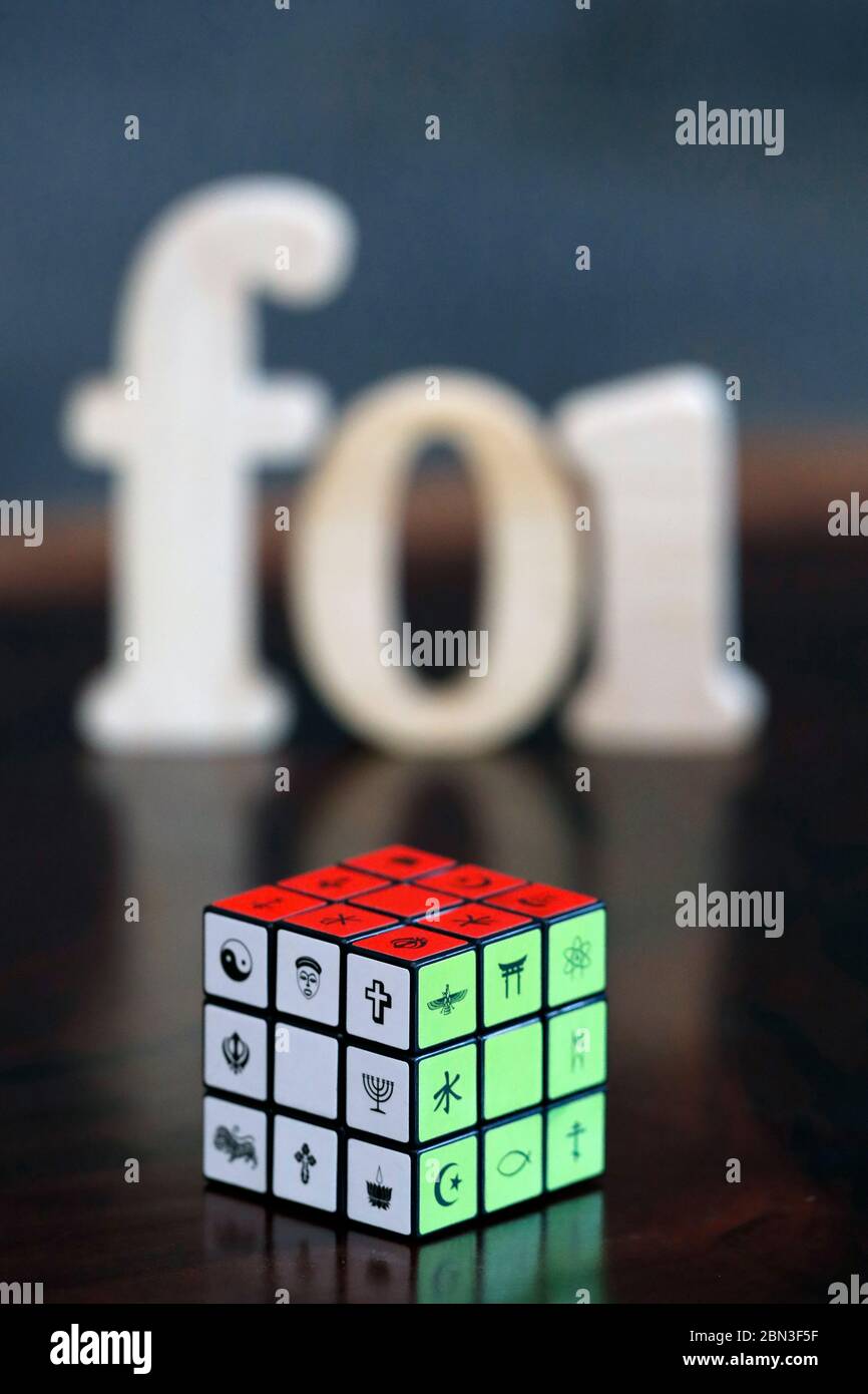 The word of foi ( faith ) and Rubik's cube with religious symbols ...