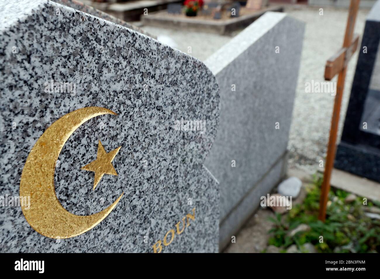 Cemetery. Muslim cresent and star on a tombstone. France Stock Photo ...