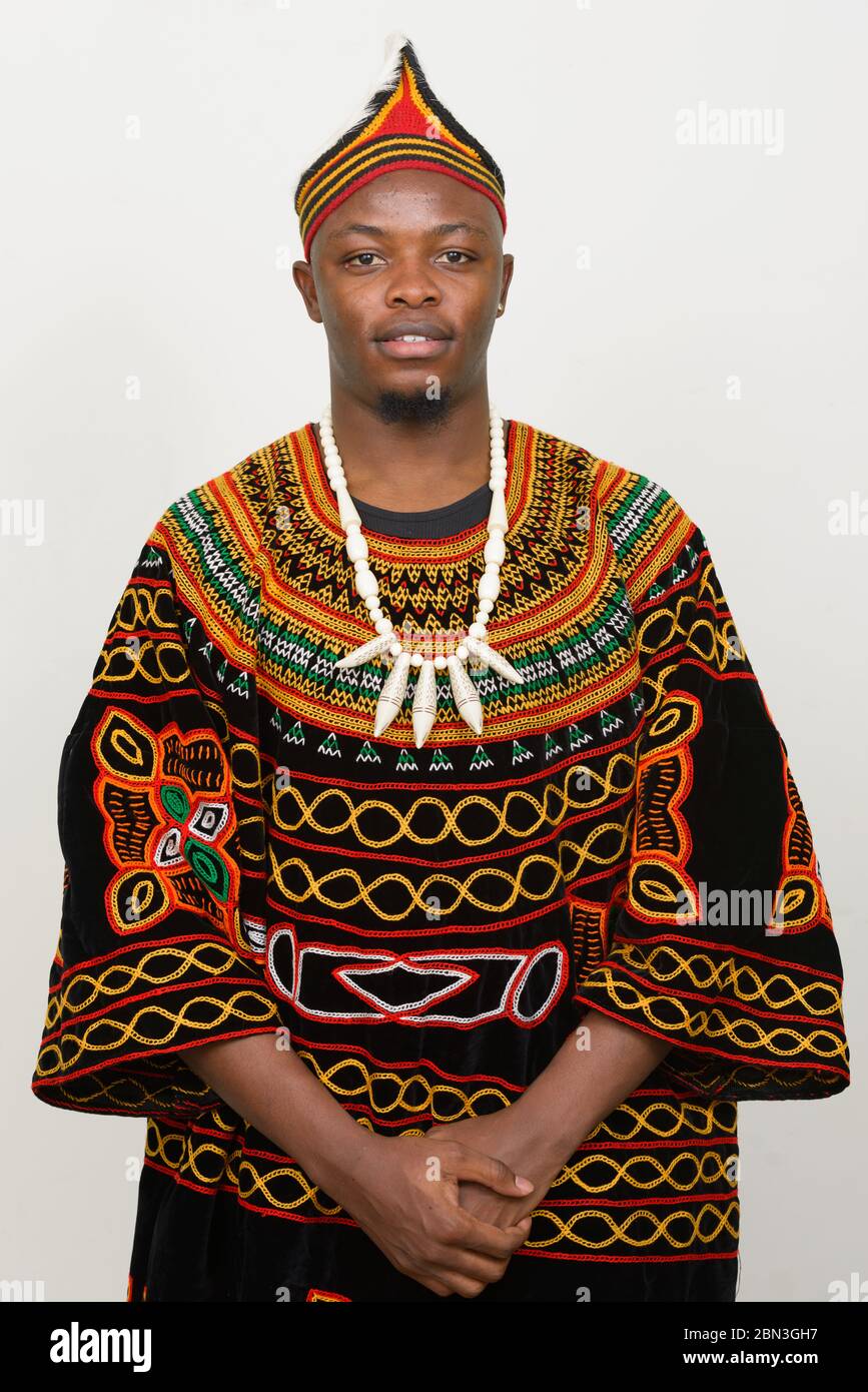 Happy young handsome African man wearing traditional clothing Stock ...