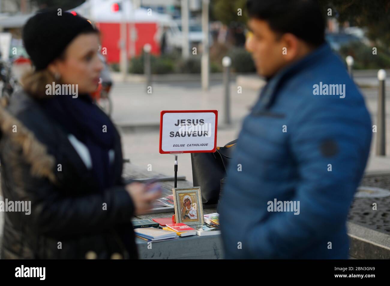 Catholic convert evangelizing in Massy, France Stock Photo - Alamy