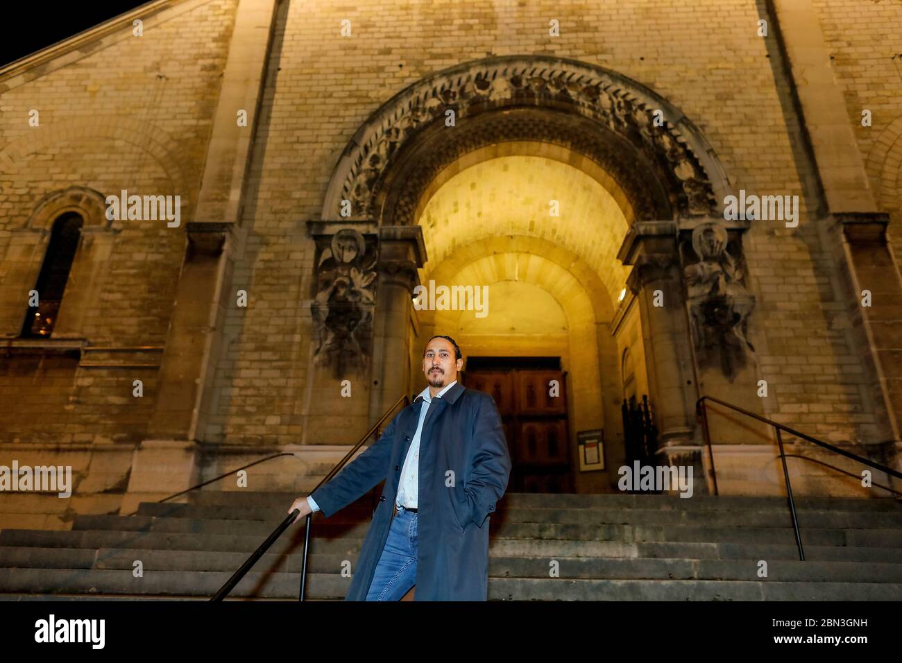 Catholic convert outside a church in Paris, France Stock Photo - Alamy