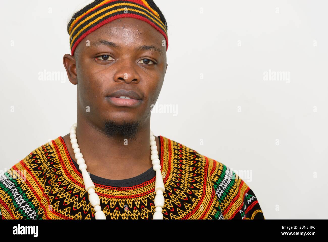 Young handsome African man wearing traditional clothing Stock Photo - Alamy