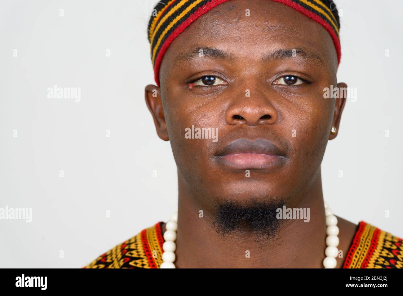 Face of young handsome African man wearing traditional clothing Stock ...