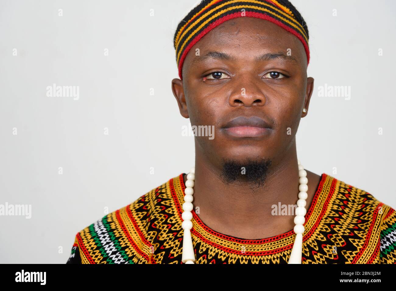Face of young handsome African man wearing traditional clothing Stock ...