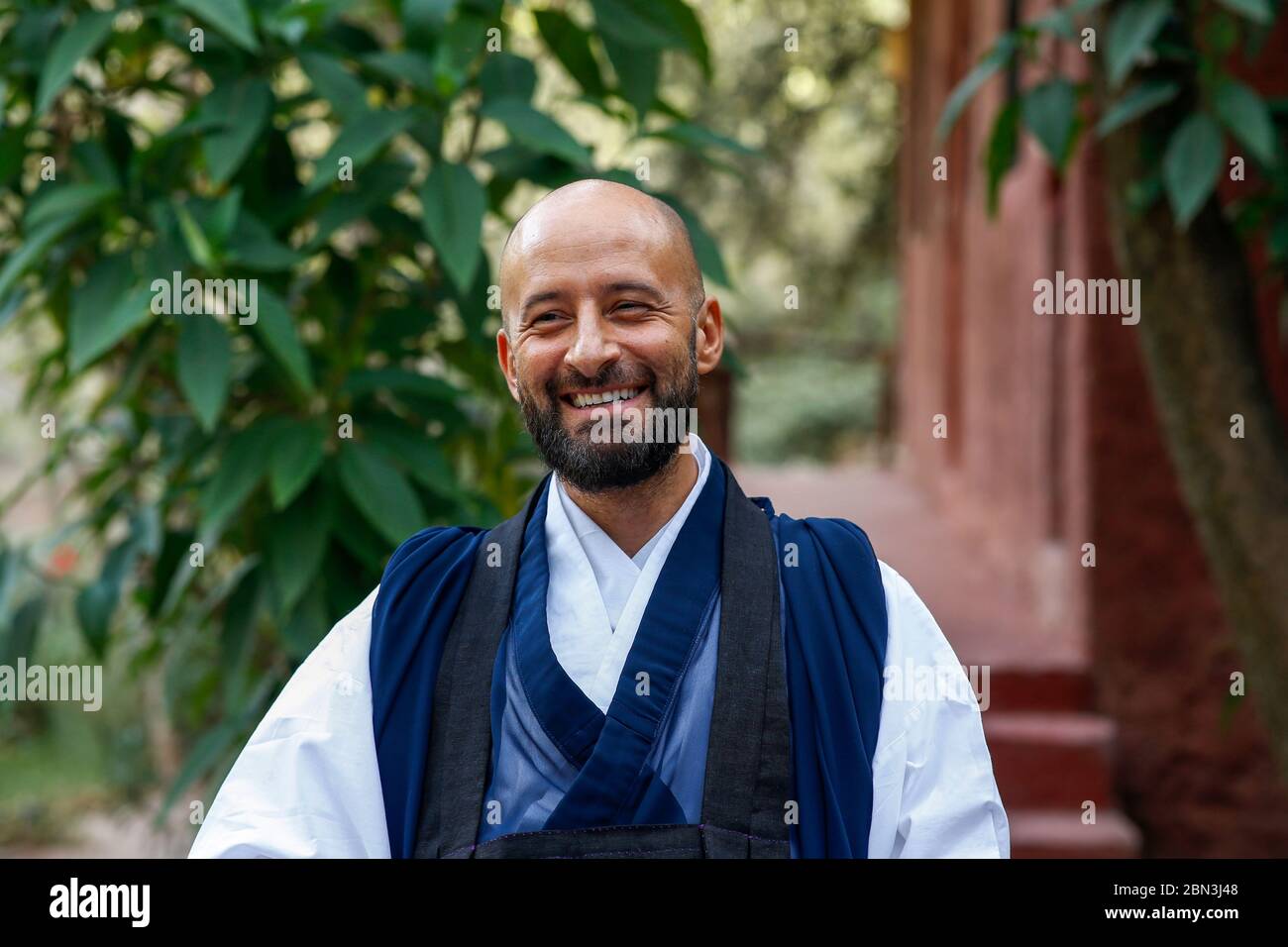 Zen master talking to disciples in Morocco Stock Photo - Alamy