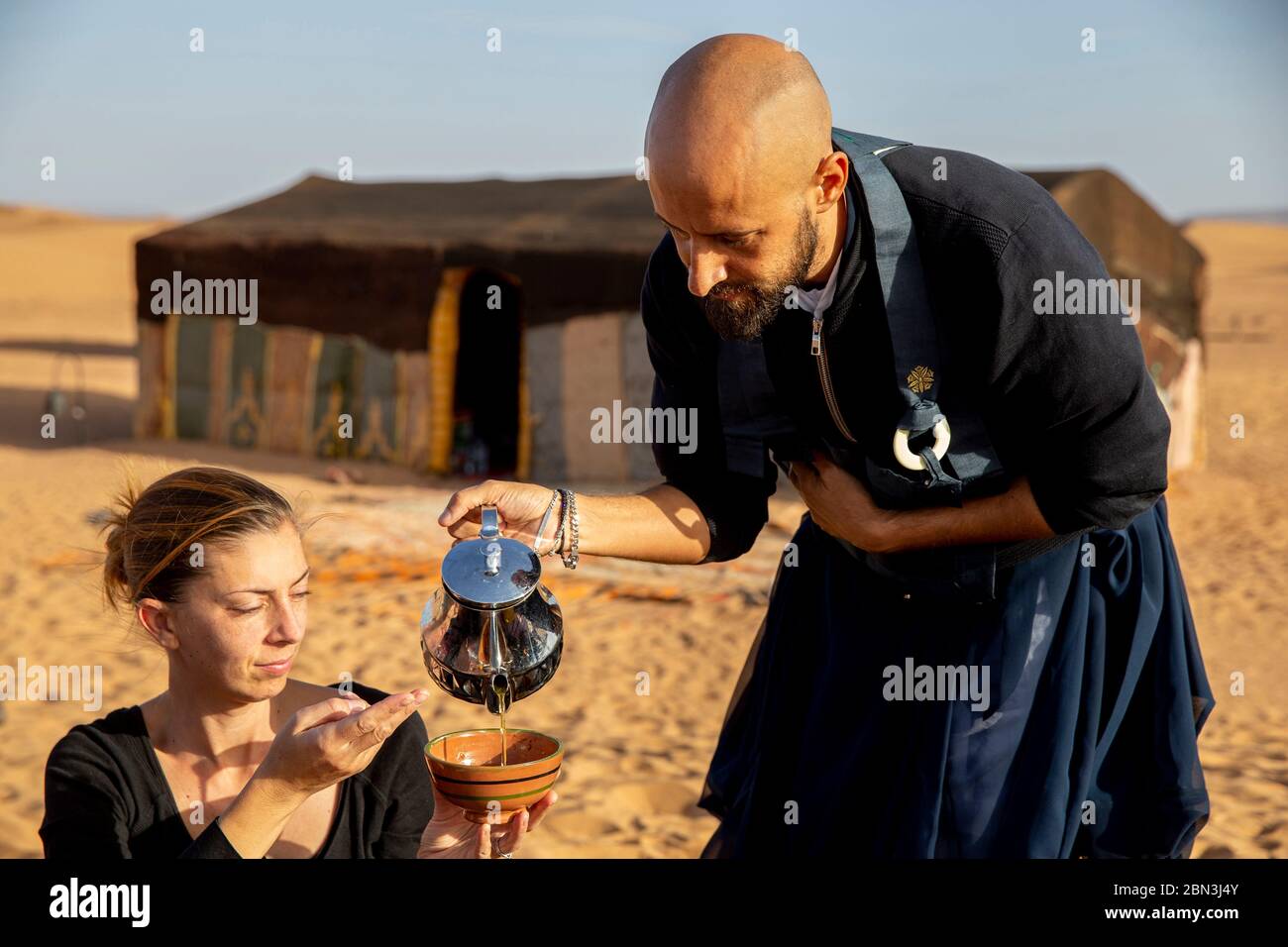Zen buddhist master serving herbal tea during a sesshin (retreat) in ...
