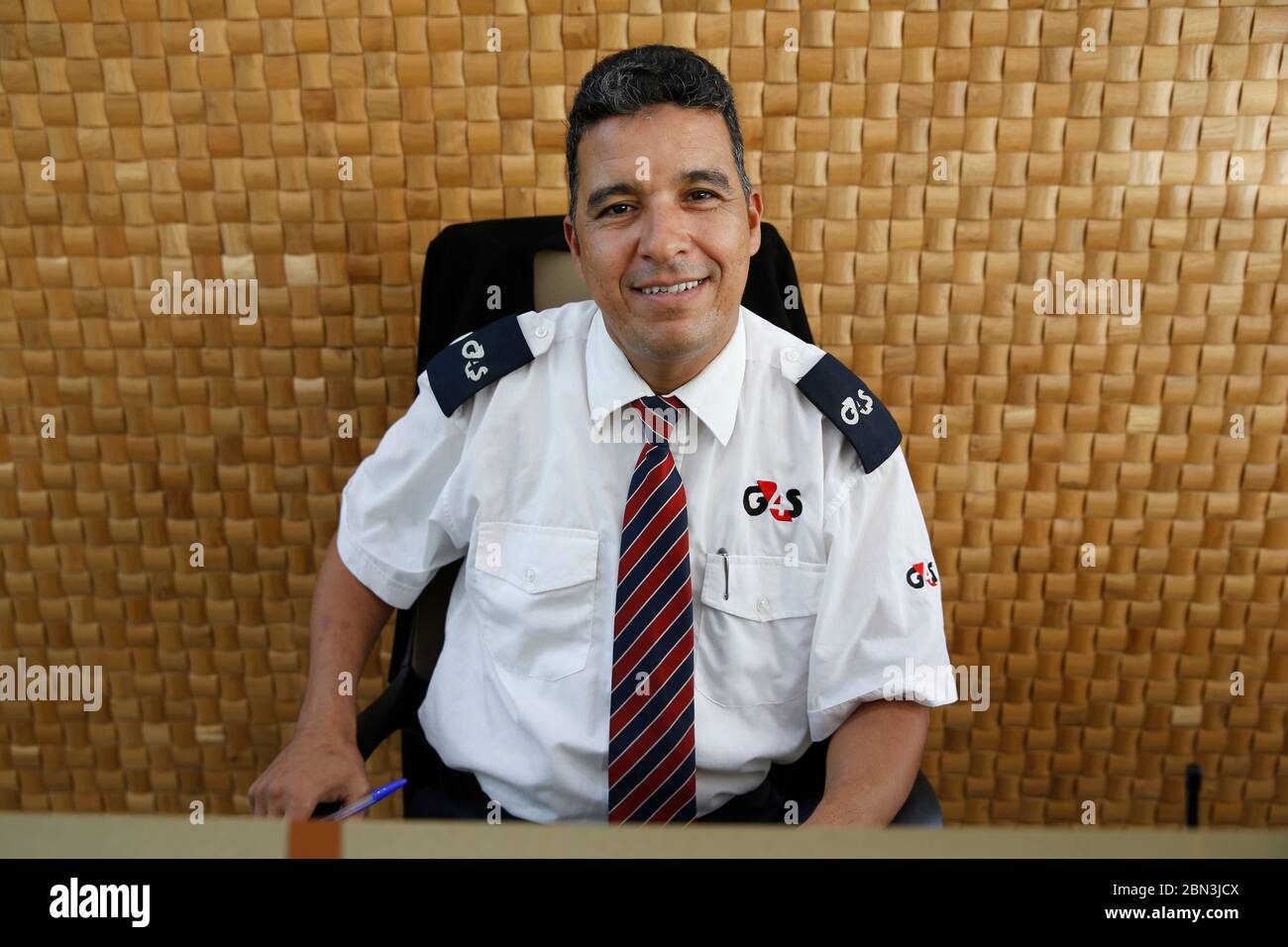 Security guard in a building, Casablanca, Morocco Stock Photo - Alamy