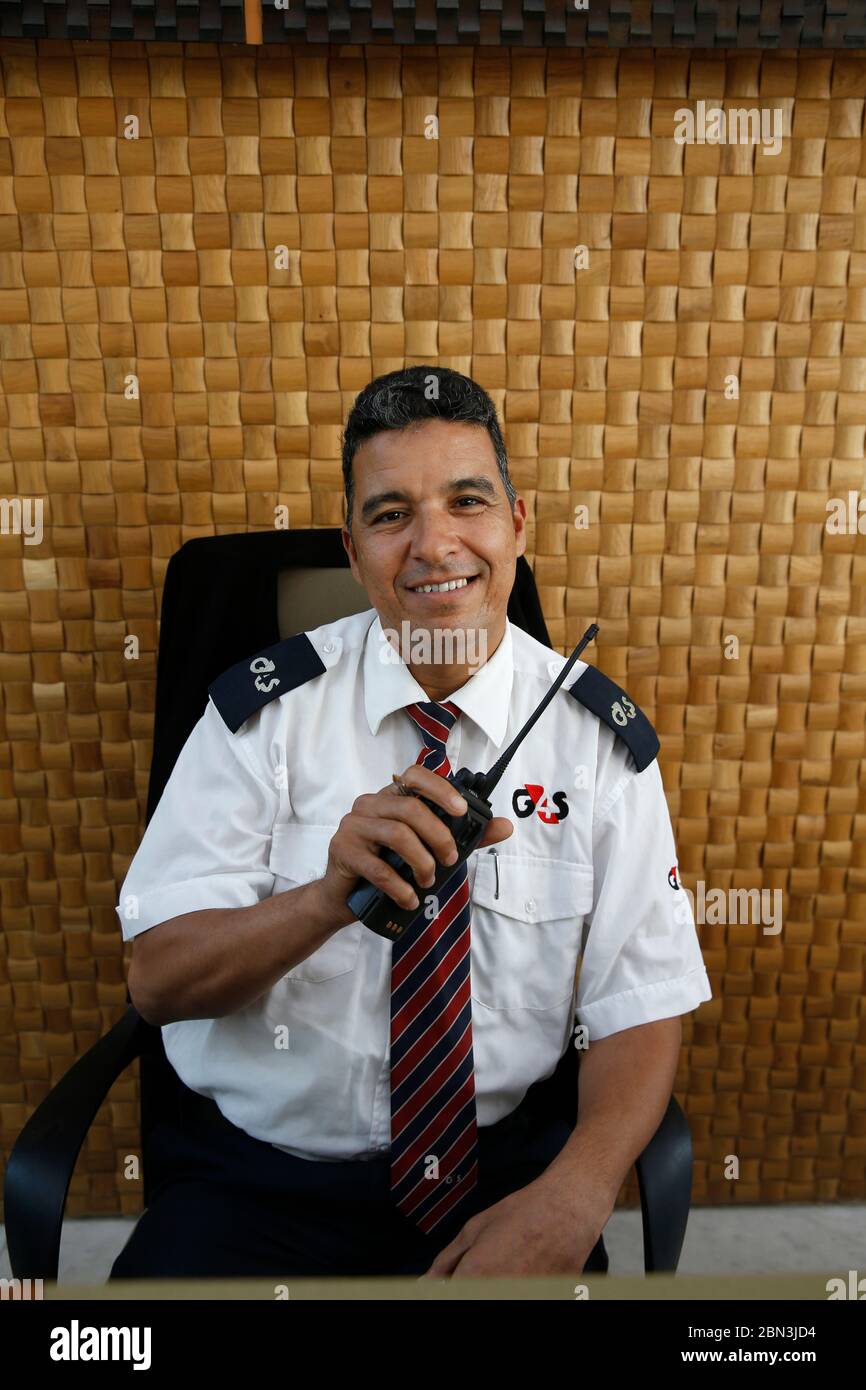 Security guard in a building, Casablanca, Morocco Stock Photo - Alamy