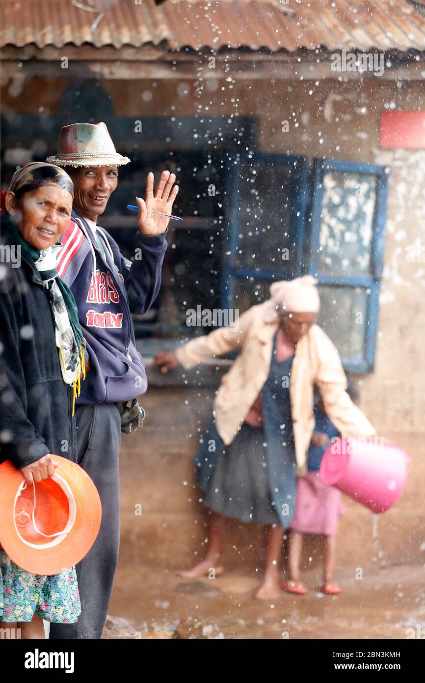 African village. Family in heavy rain. Madagascar Stock Photo - Alamy