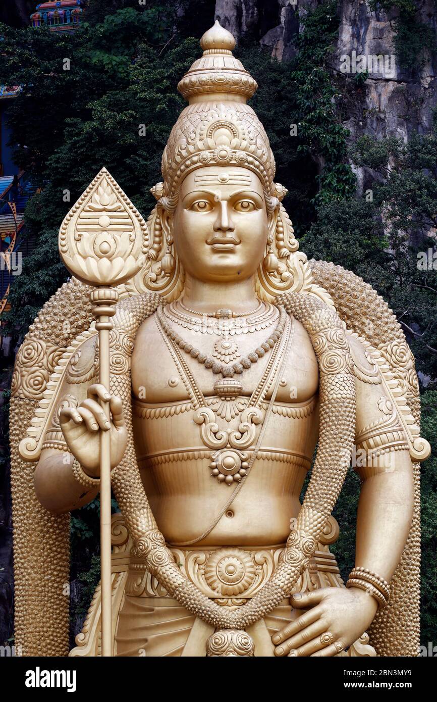 Murugan, the Hindu god of war. Hindu temple and shrine of Batu Caves ...