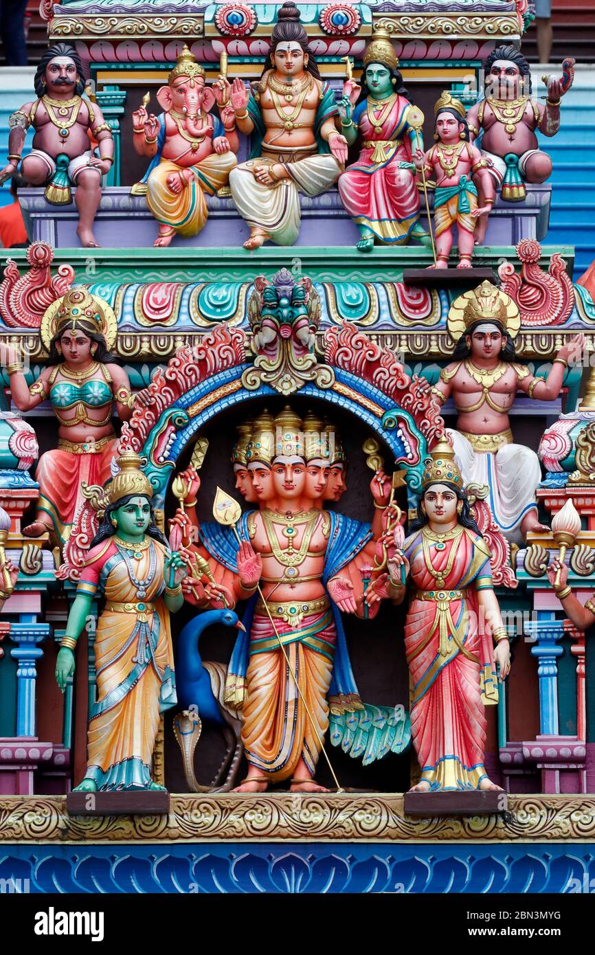 Hindu temple and shrine of Batu Caves. Colorful statues of various ...