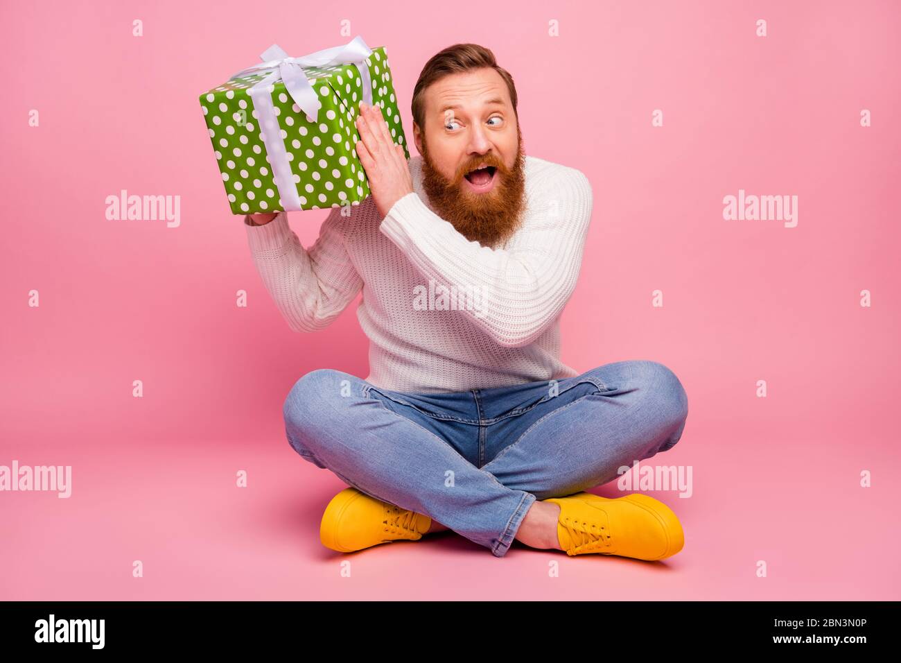 Legs folded hi-res stock photography and images - Alamy