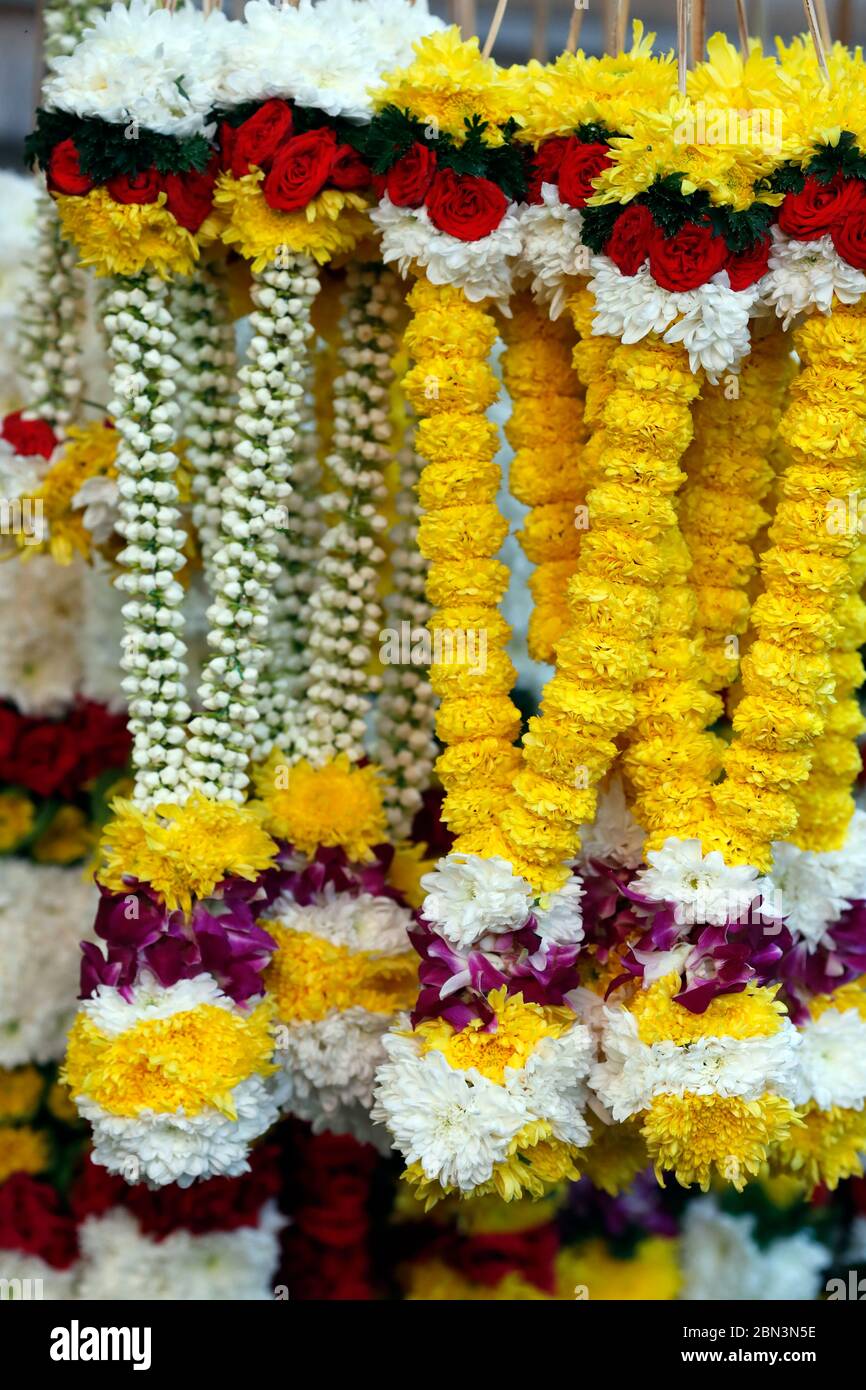 Court Hill Ganesh Temple. Flowers are sold by vendors in the streets to ...