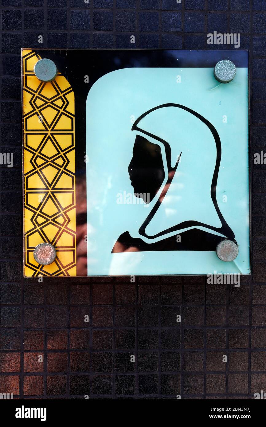 The National Mosque or Masjid Negara. Veiled muslim woman sign. Kuala ...