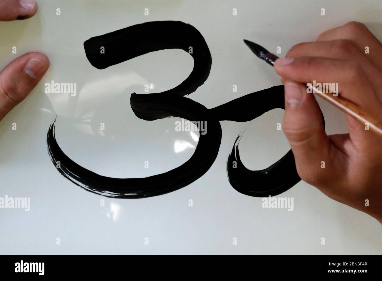 Om calligraphy hi-res stock photography and images - Alamy